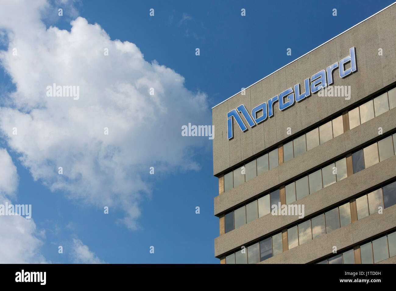A logo sign outside of the headquarters of the Morguard Corporation in ...