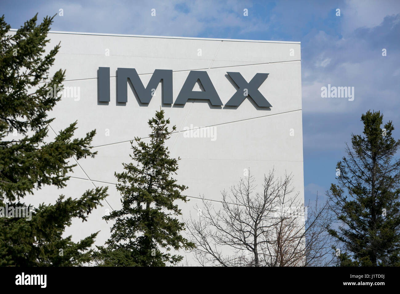 A logo sign outside of the headquarters of the IMAX Corporation in ...
