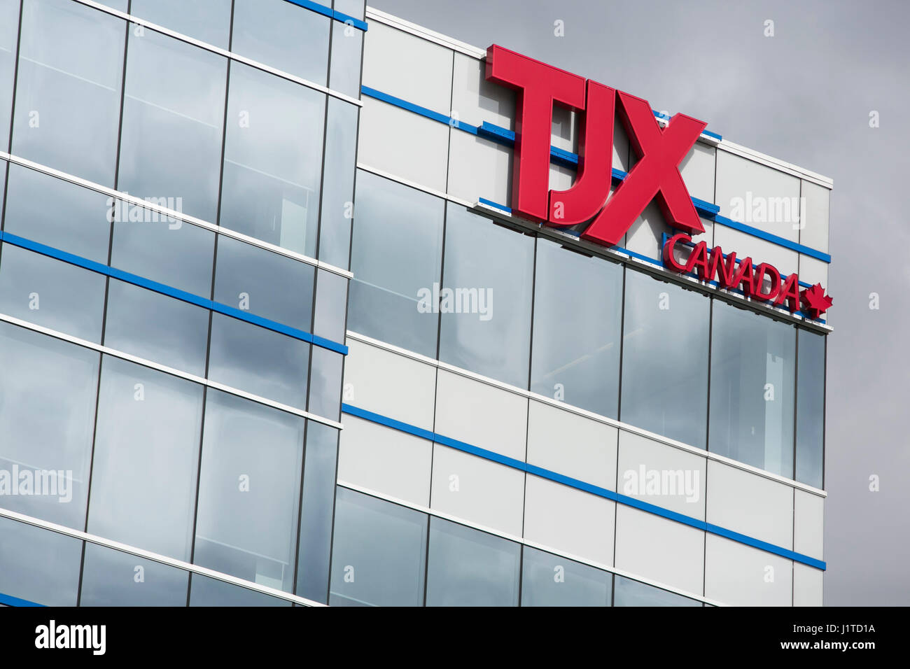 A logo sign outside of the Canadian headquarters of the TJX Companies ...