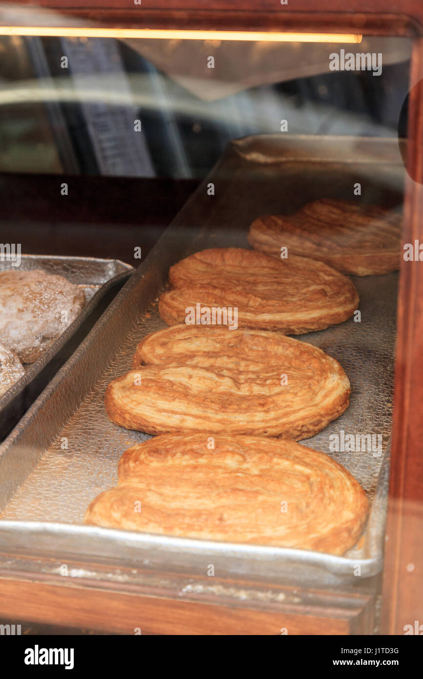 Sweet bread bear claw pastry in a bakery window Stock Photo - Alamy