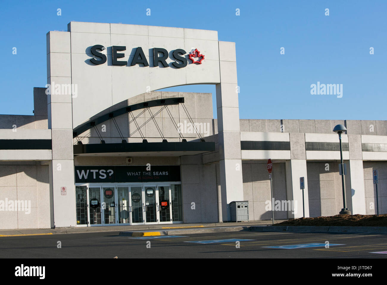 A logo sign outside of a Sears retail store in Burlington, ON, Canada ...