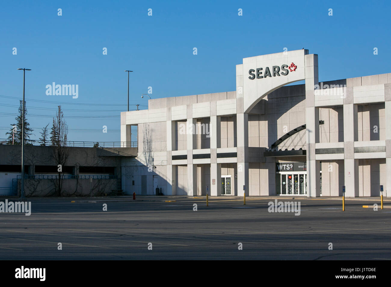 A logo sign outside of a Sears retail store in Burlington, ON, Canada ...