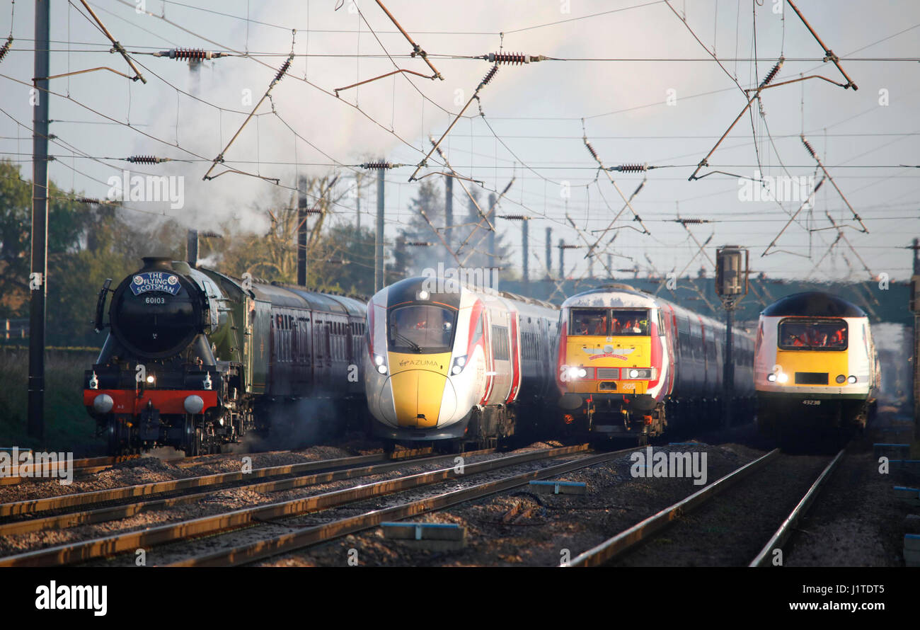 EDITORIAL USE ONLY (left to right) The Flying Scotsman and Virgin Trains' new Azuma travel in ...