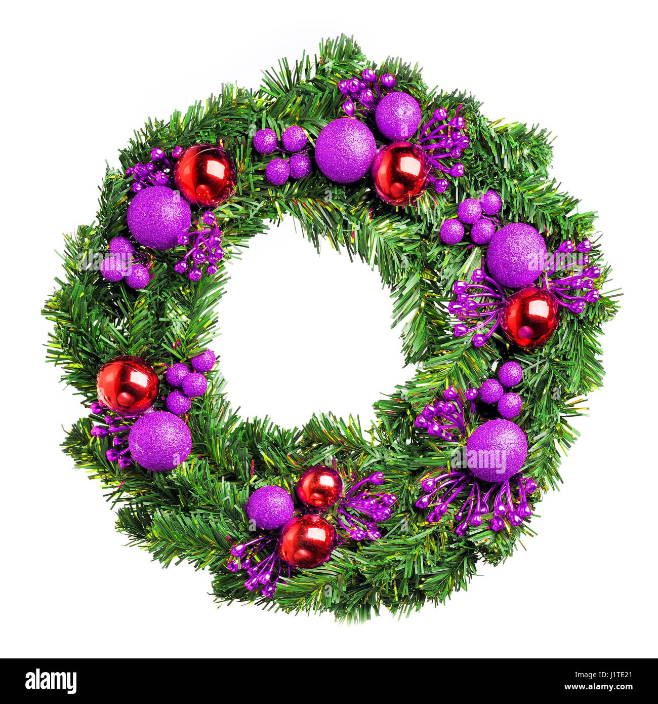Loaded Christmas wreath isolated on white Stock Photo - Alamy