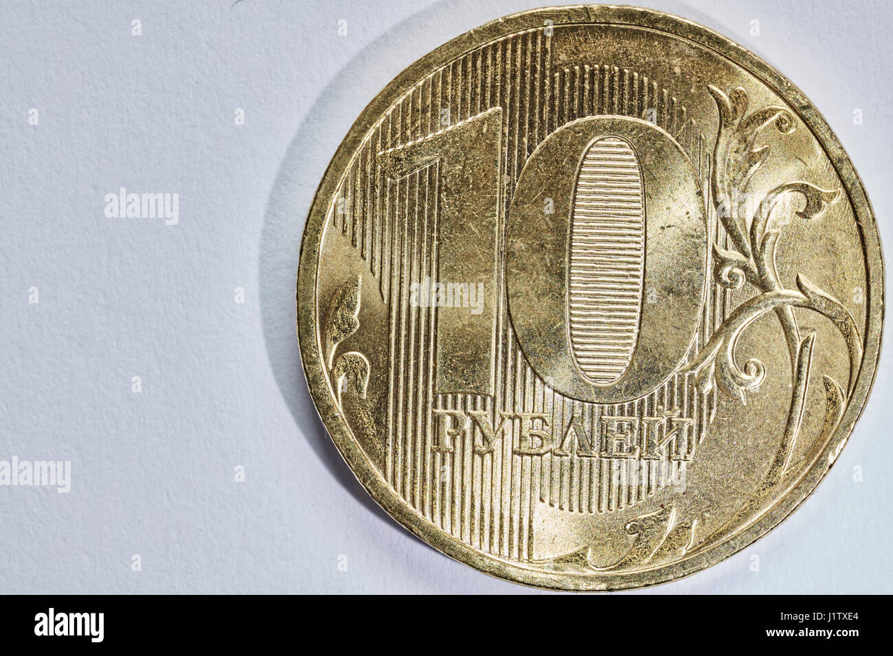 Rubl coins macro isolated on white surface Stock Photo - Alamy