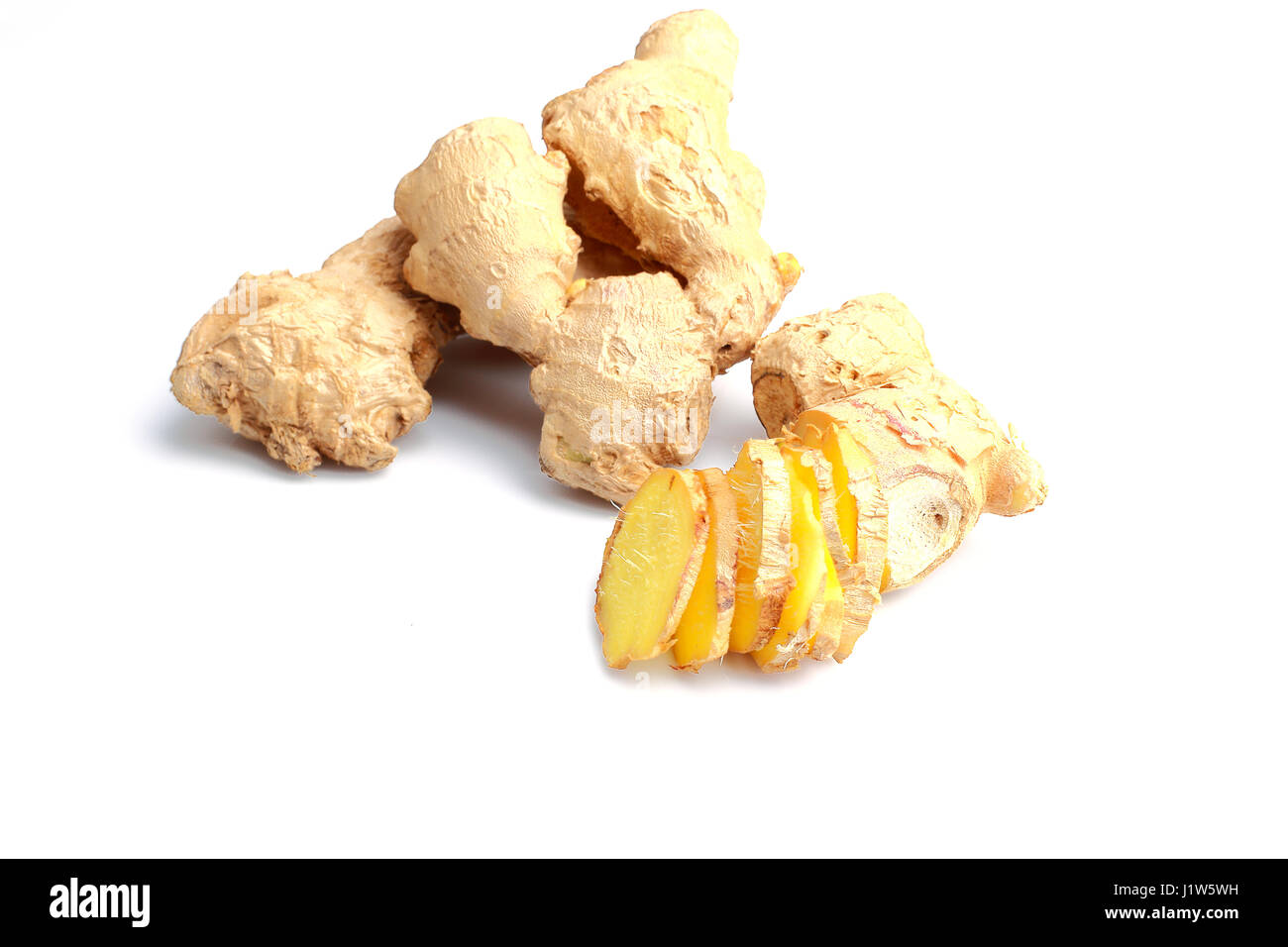 Close-up shot of sliced ginger isolated on white background Stock Photo ...
