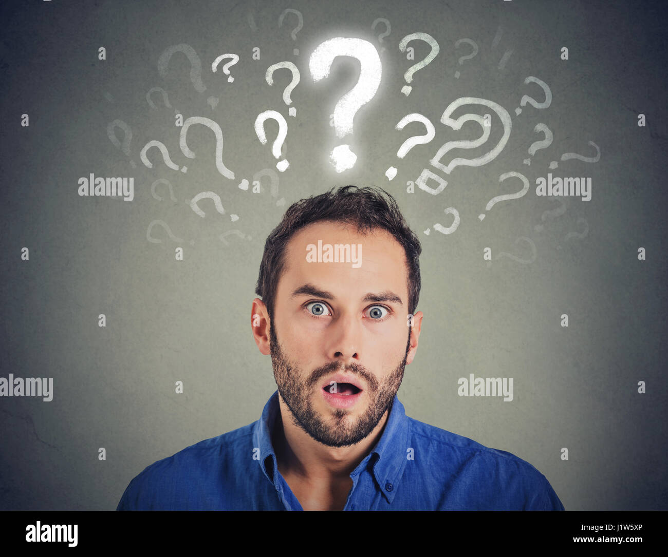 Funny young guy question mark hi-res stock photography and images - Alamy