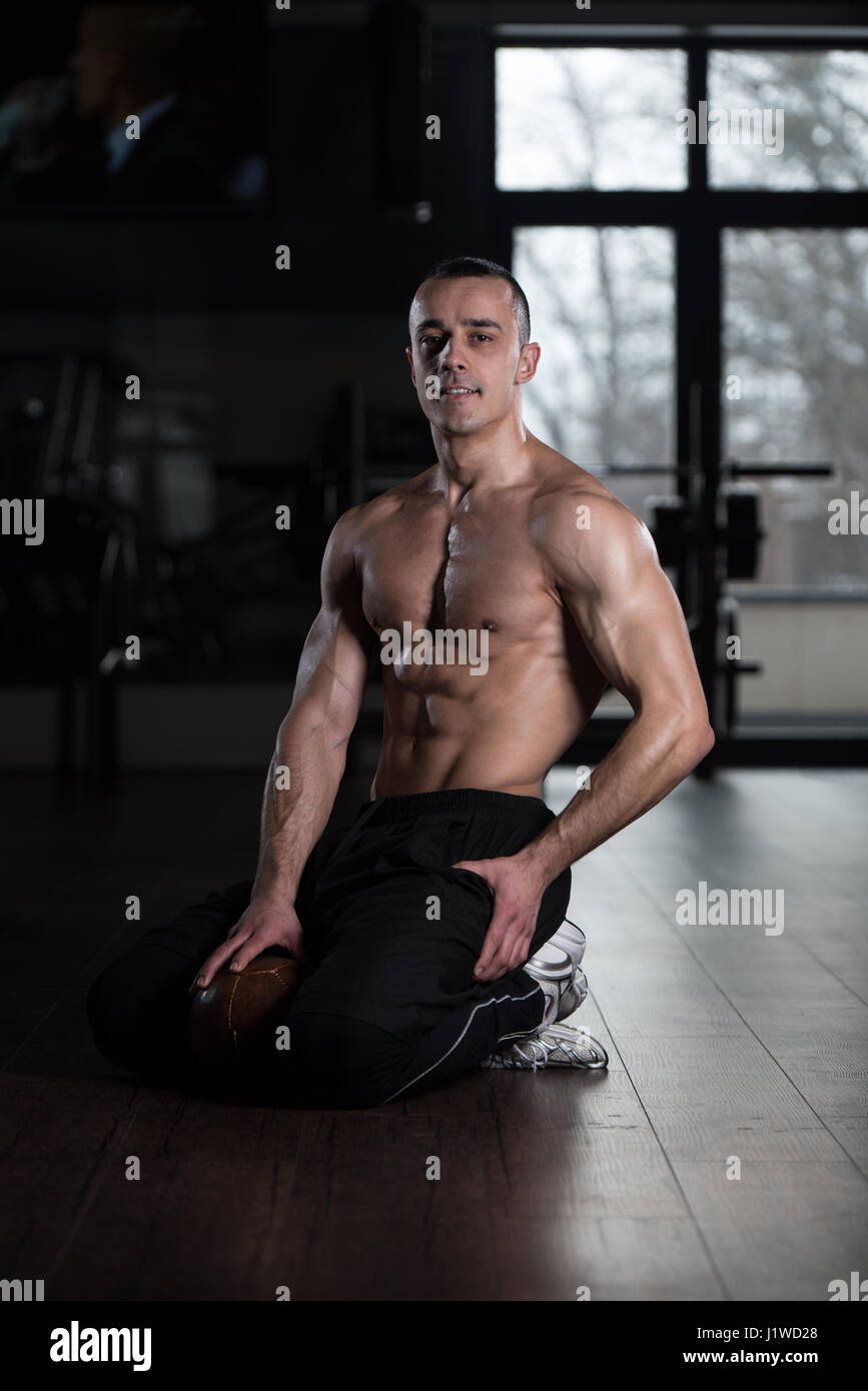 Muscular Man Resting After Exercises - Portrait Of A Physically Fit ...