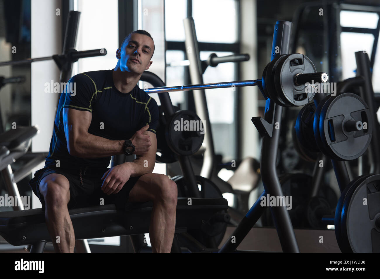 Resting Time - Confident Muscled Young Man Resting In Healthy Club Gym ...