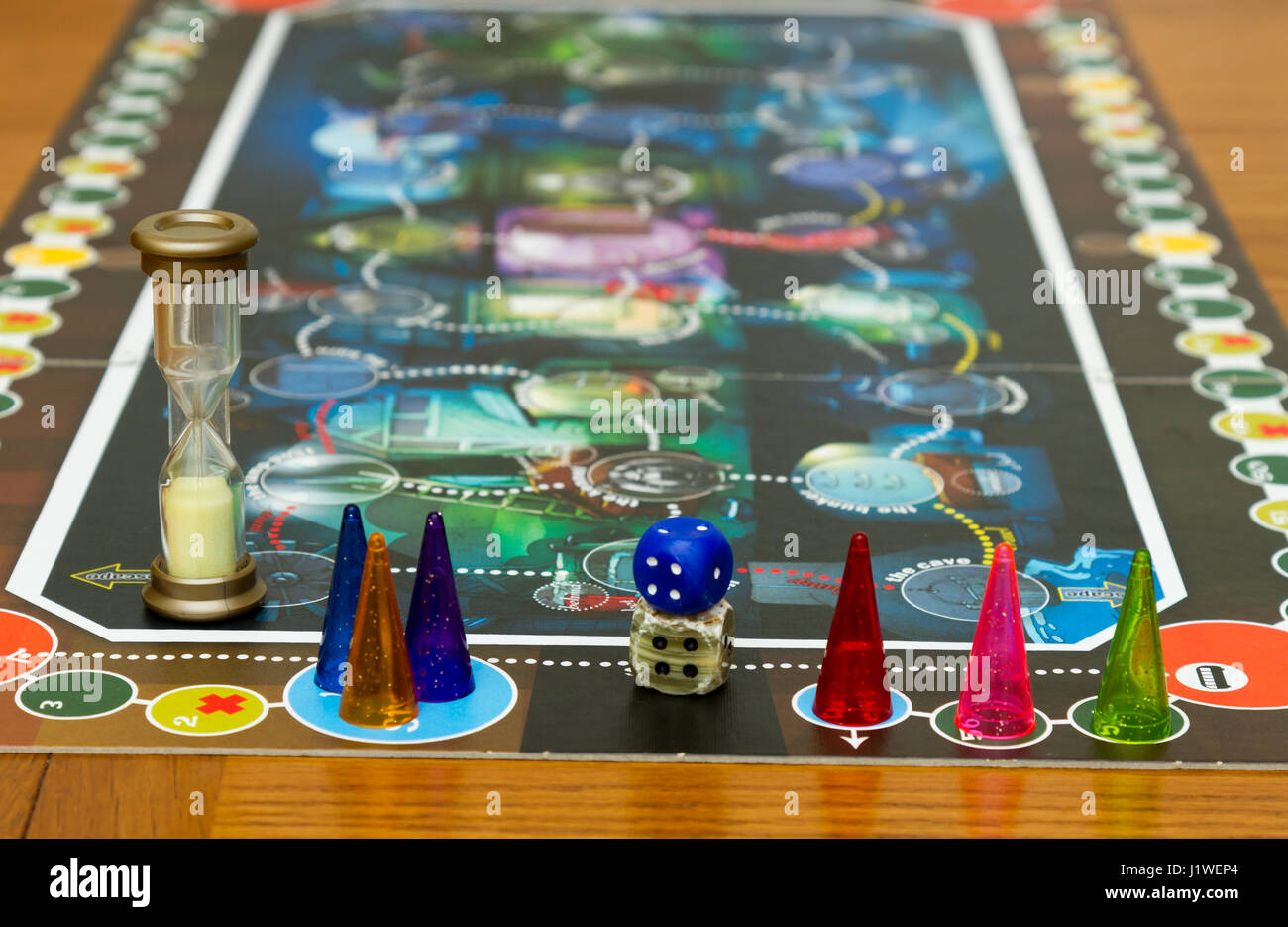 Cubes with the game monopoly on the table macro Stock Photo - Alamy