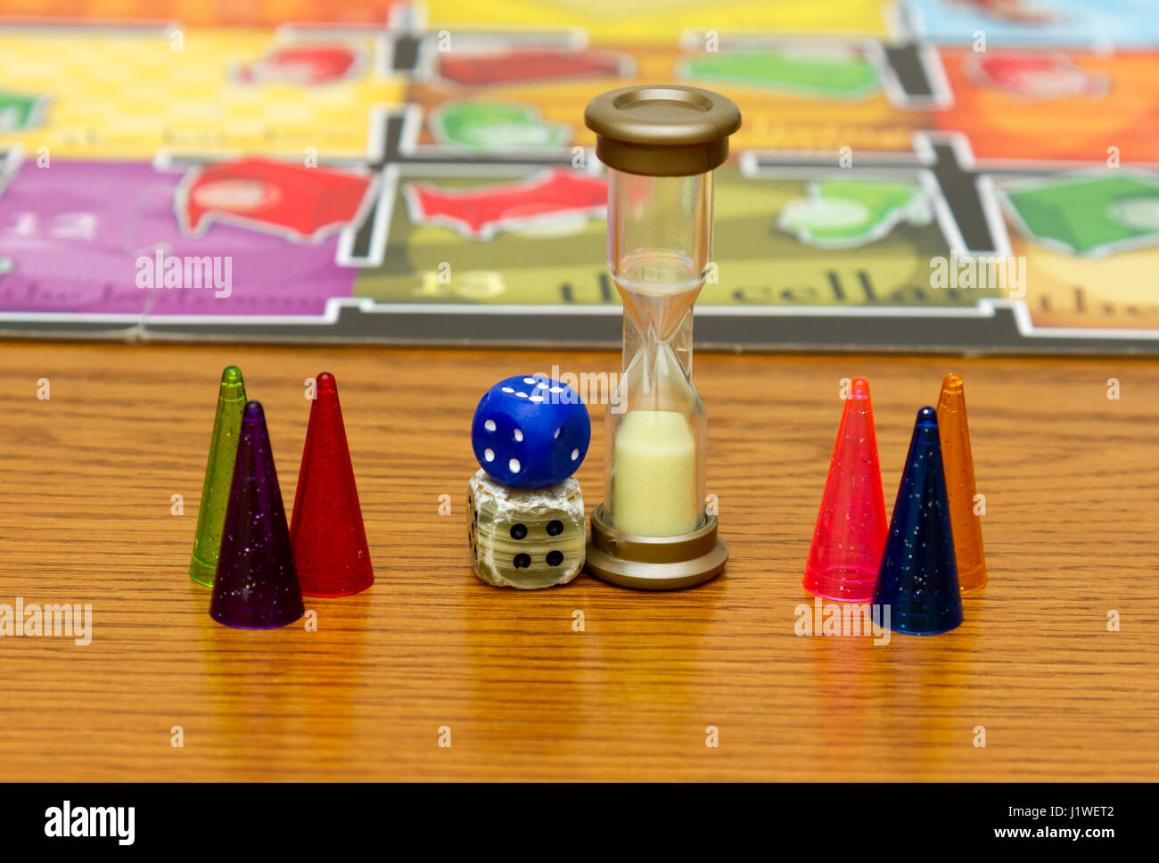 Cubes with the game monopoly on the table macro Stock Photo - Alamy