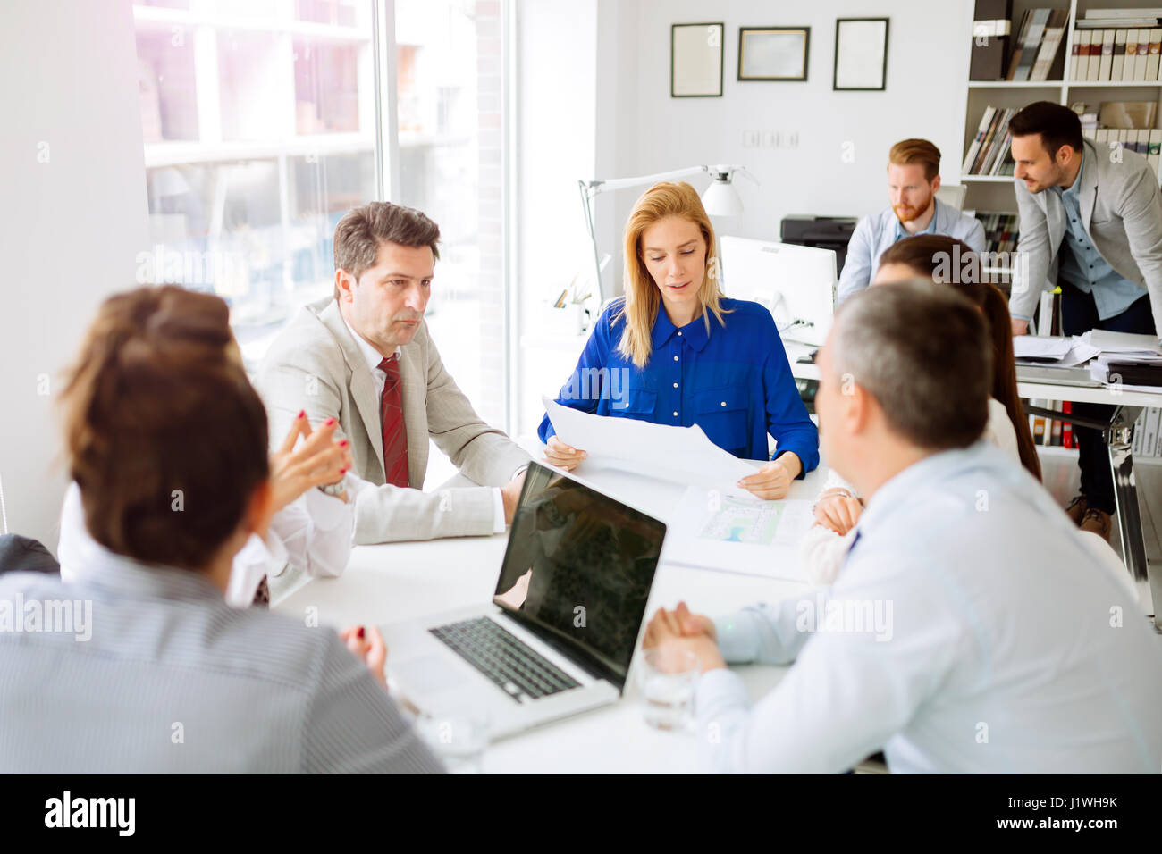 Business people and architects discussing future plans Stock Photo - Alamy