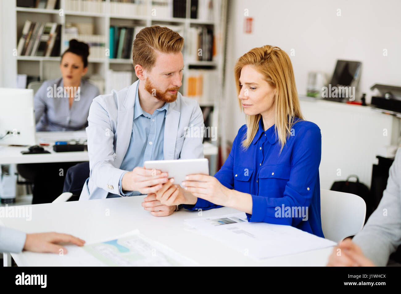 Business coworkers teamwork in office Stock Photo - Alamy