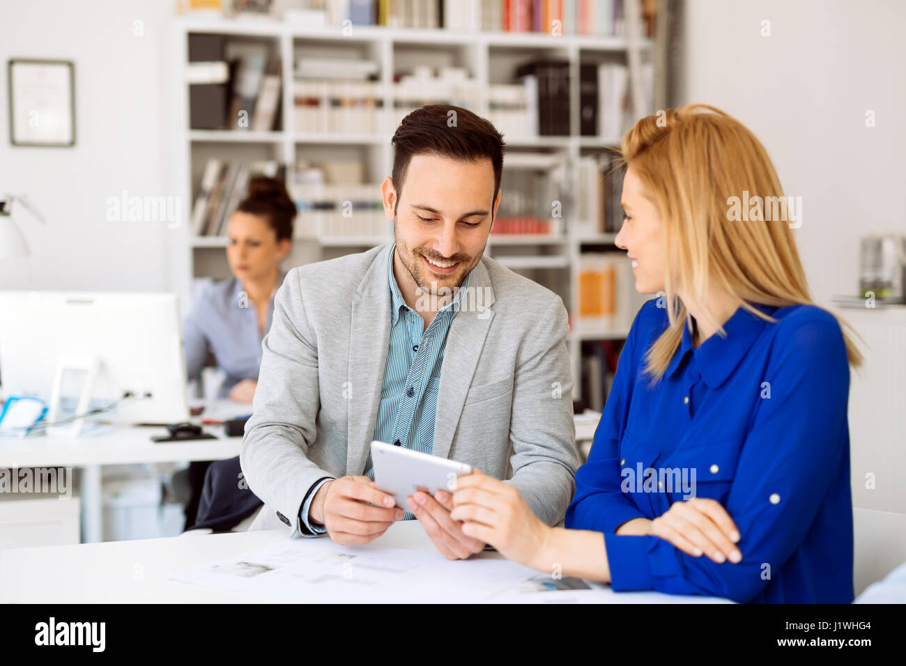 Business people working in office and collaborating Stock Photo - Alamy