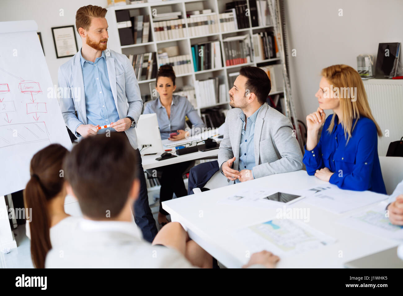 Busy business people working in office Stock Photo - Alamy
