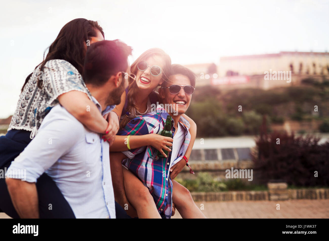 Happy group of friends enjoying festival and having fun Stock Photo - Alamy