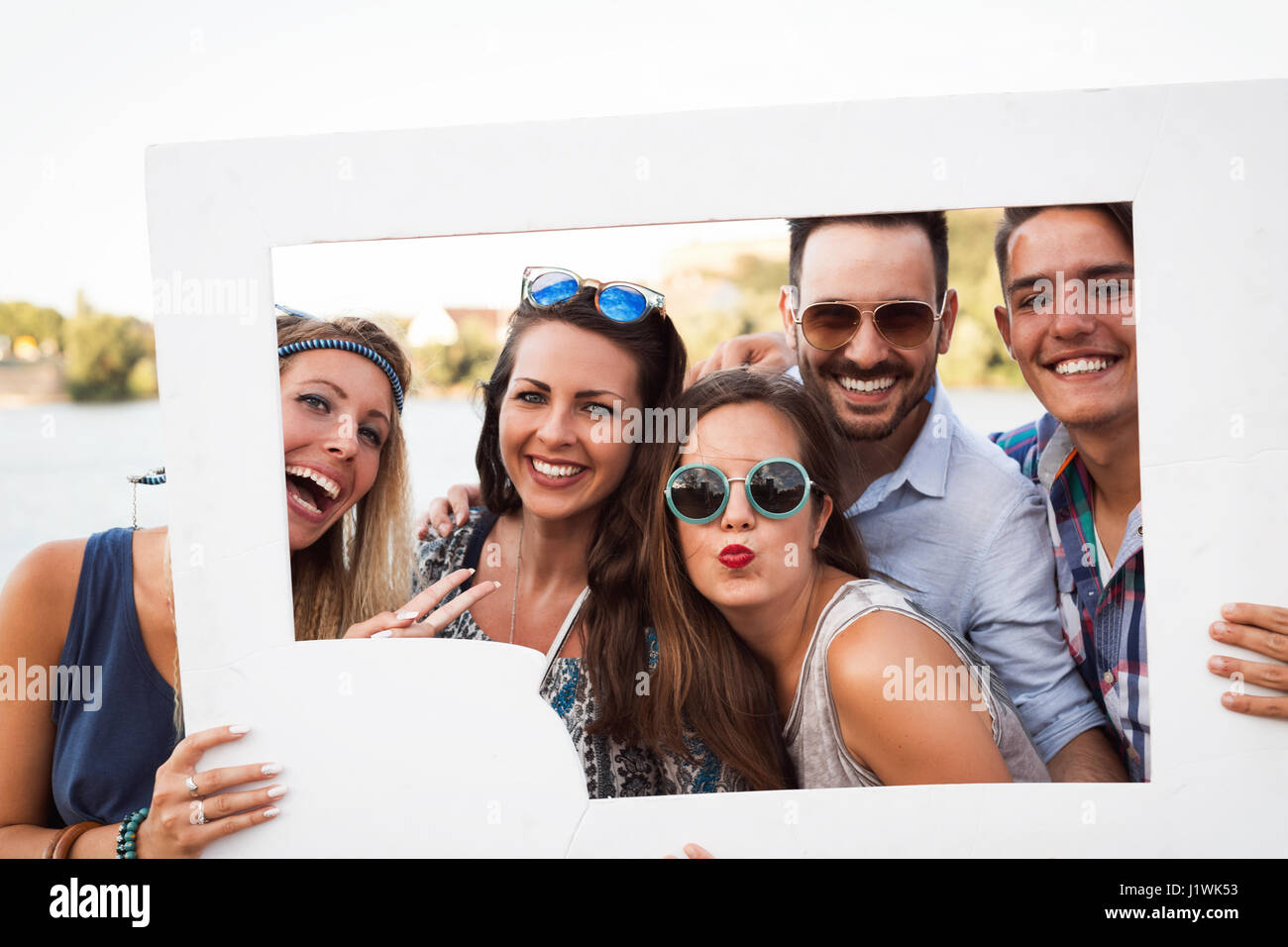 Beautiful happy friends laughing and smiling outdoors Stock Photo - Alamy