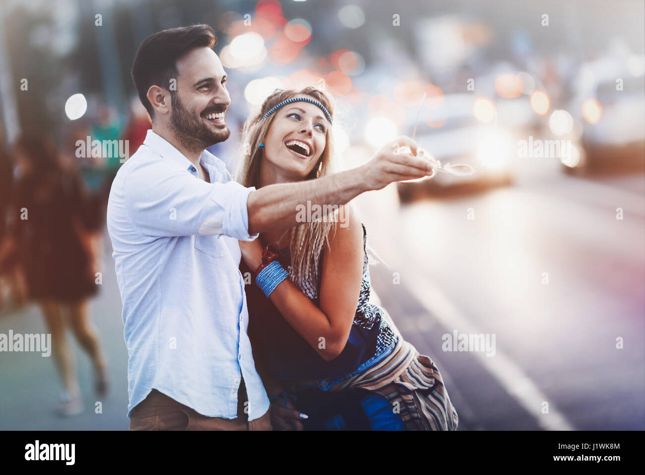 Happy beautiful couple in love having fun in city Stock Photo - Alamy