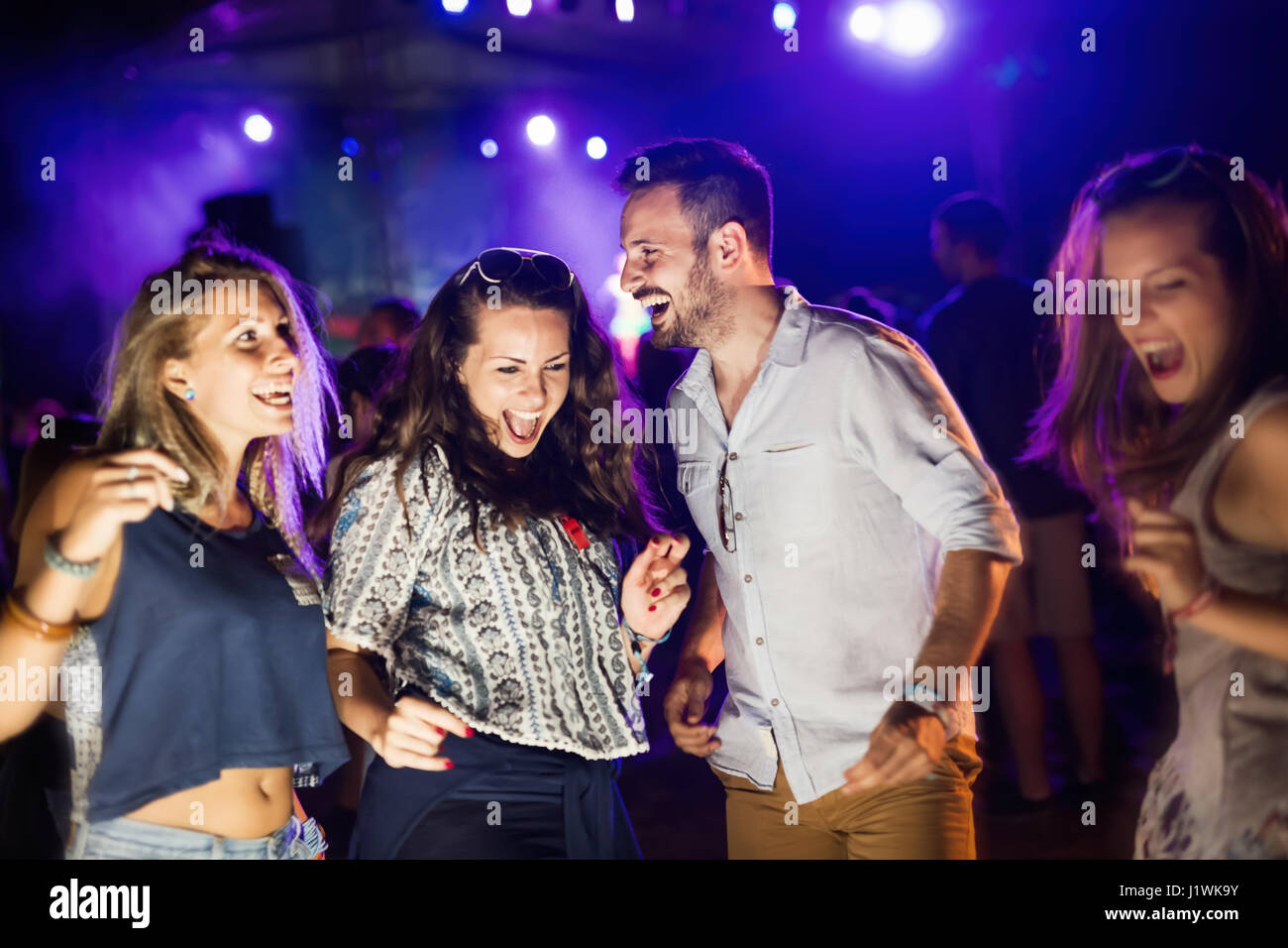 Friends at outdoor concert hi-res stock photography and images - Alamy
