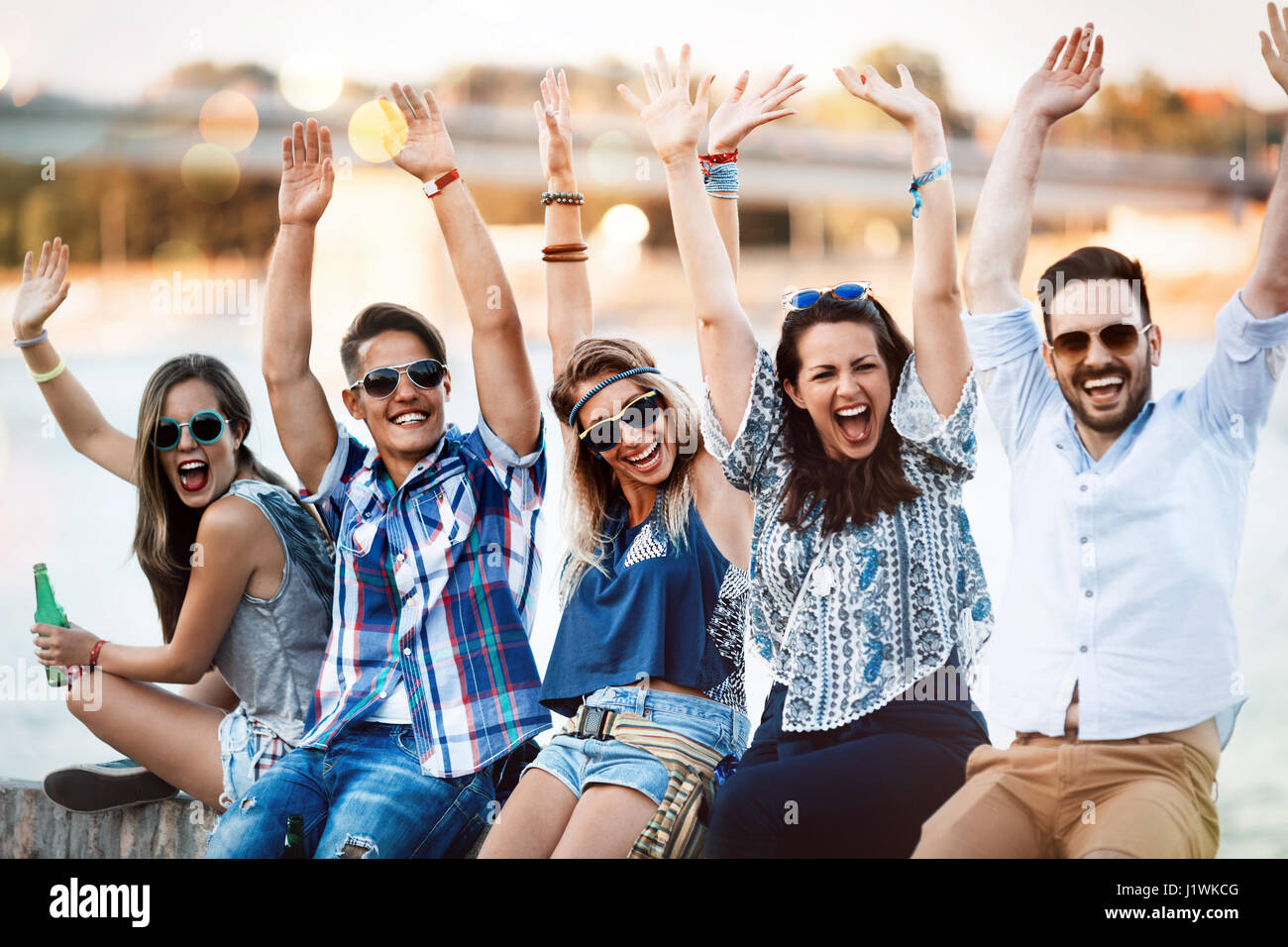 Beautiful happy friends laughing and smiling outdoors Stock Photo - Alamy