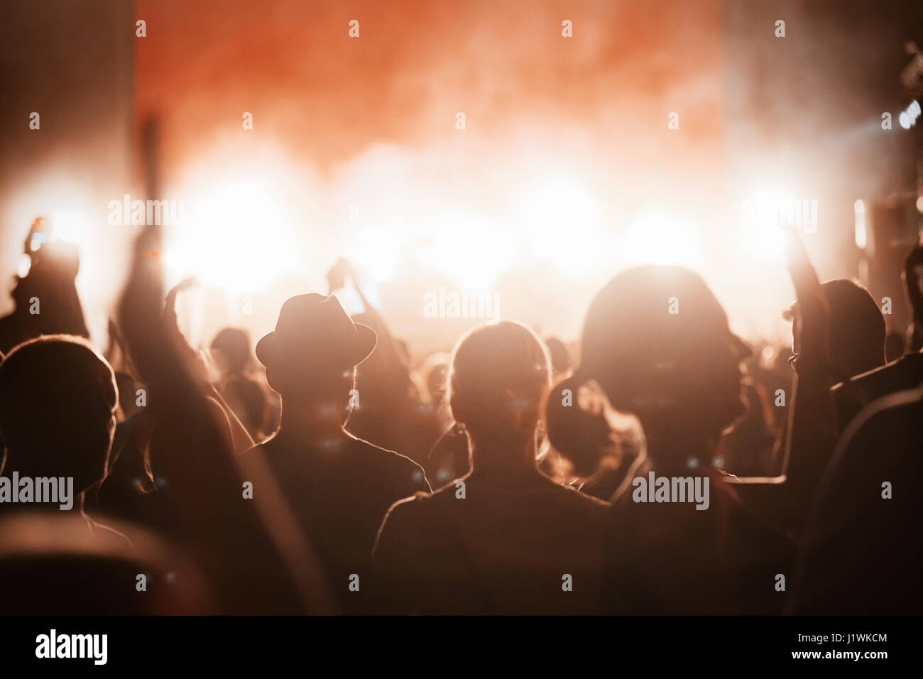 Happy friends laughing and having fun outdoors at concert Stock Photo ...