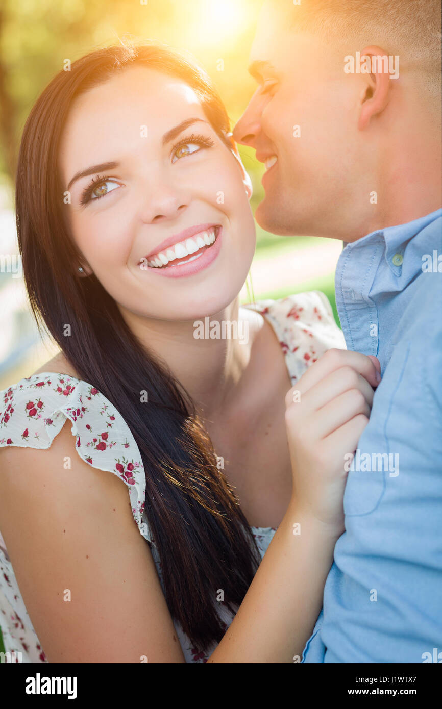 Happy Mixed Race Romantic Couple Portrait in the Park Stock Photo - Alamy