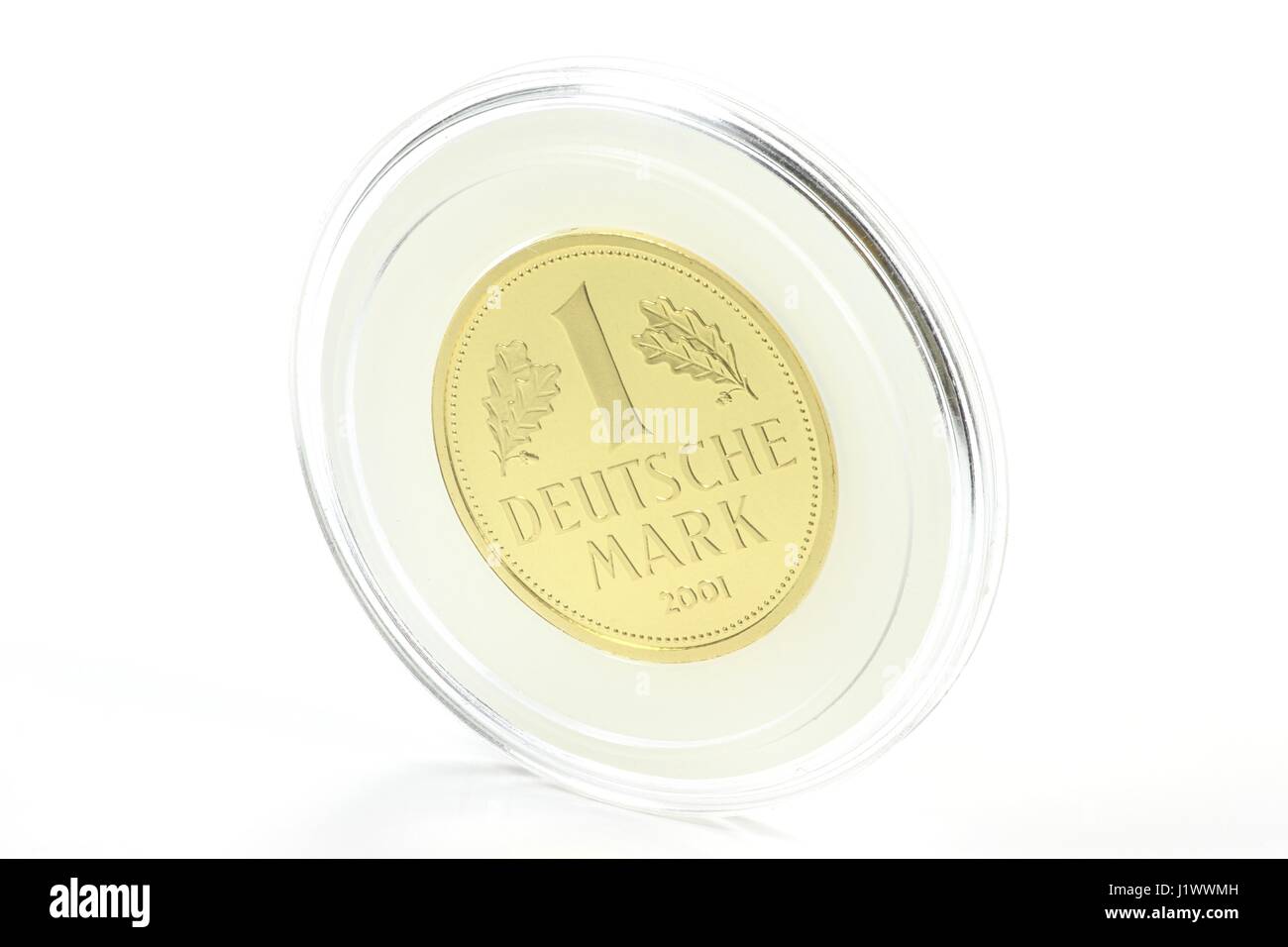 special gold issue of the German 1 Mark coin isolated on white ...