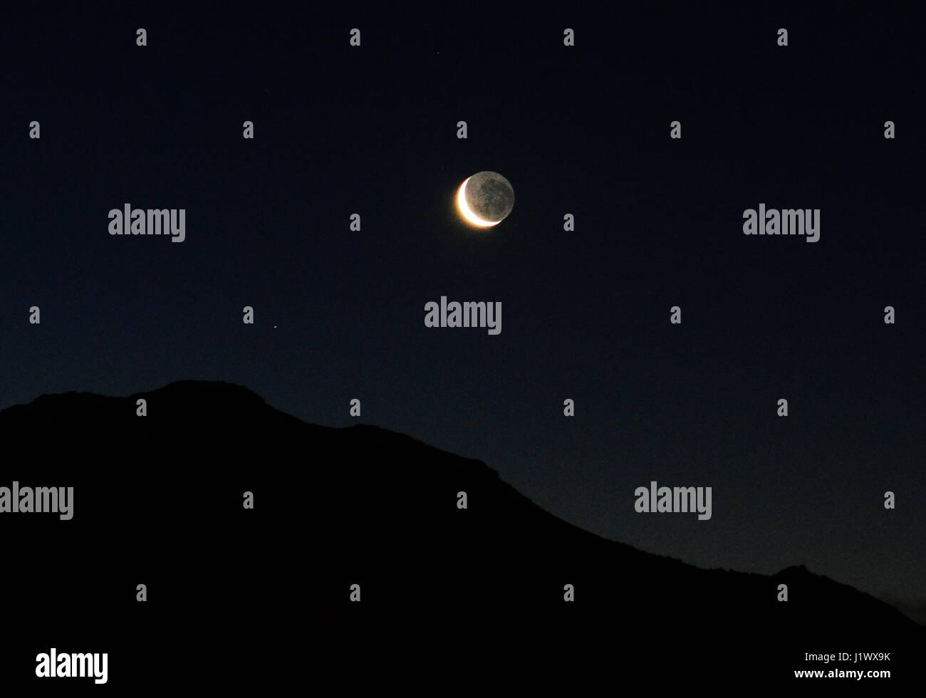 Moon set over earth hi-res stock photography and images - Alamy