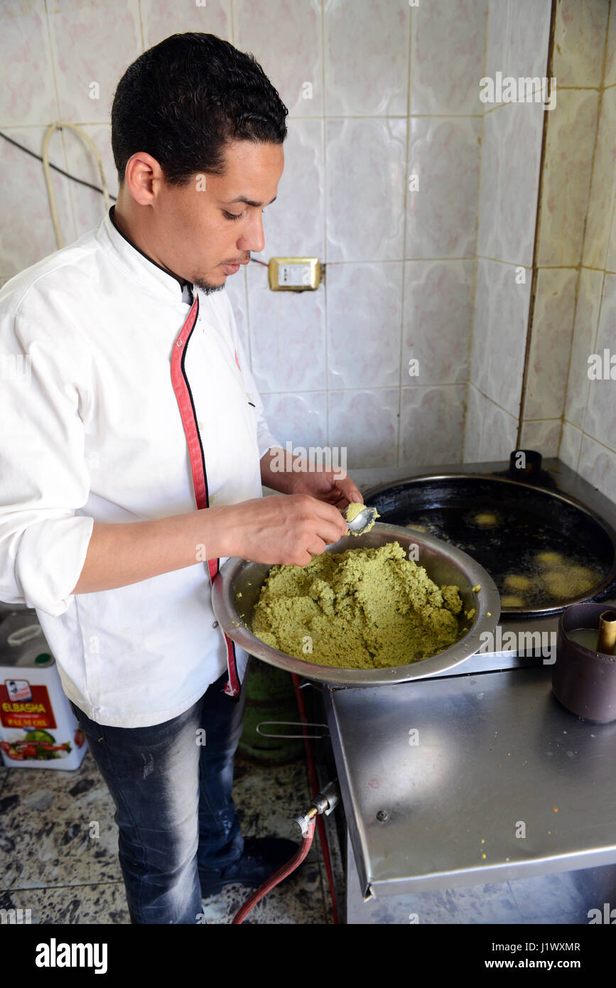 A Jordanian man preparing Falafel in his small Falafel shop in South ...