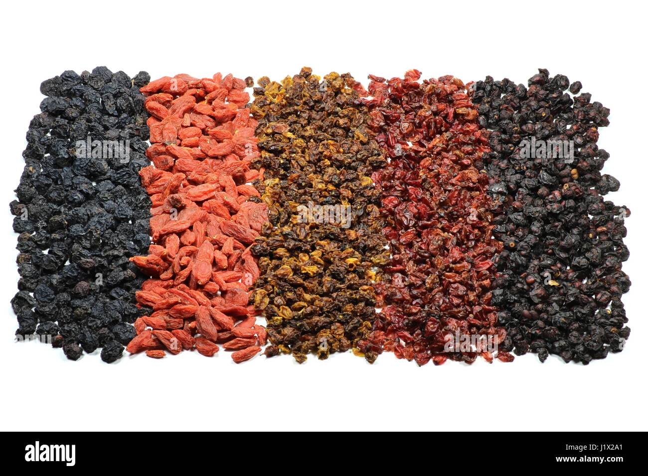 assortment of dried berries isolated on white background Stock Photo ...