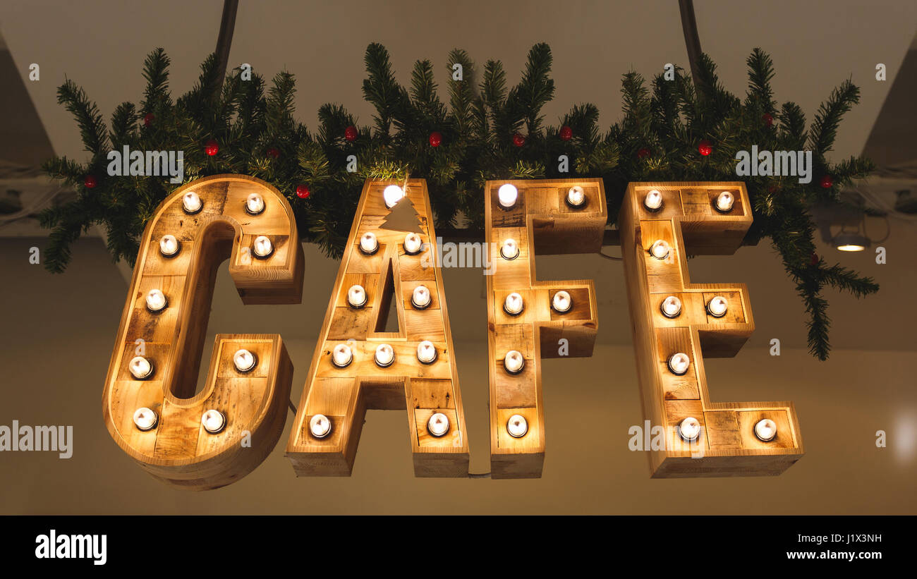 The large decorated by lamps letters CAFE Stock Photo - Alamy