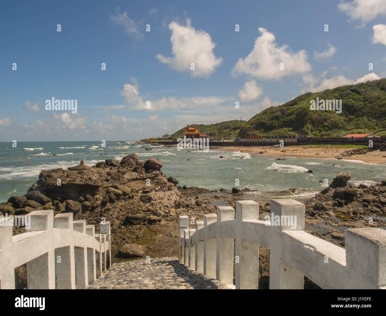 Shimen, Taiwan - October 03, 2016: A white bridge between the rocks and ...