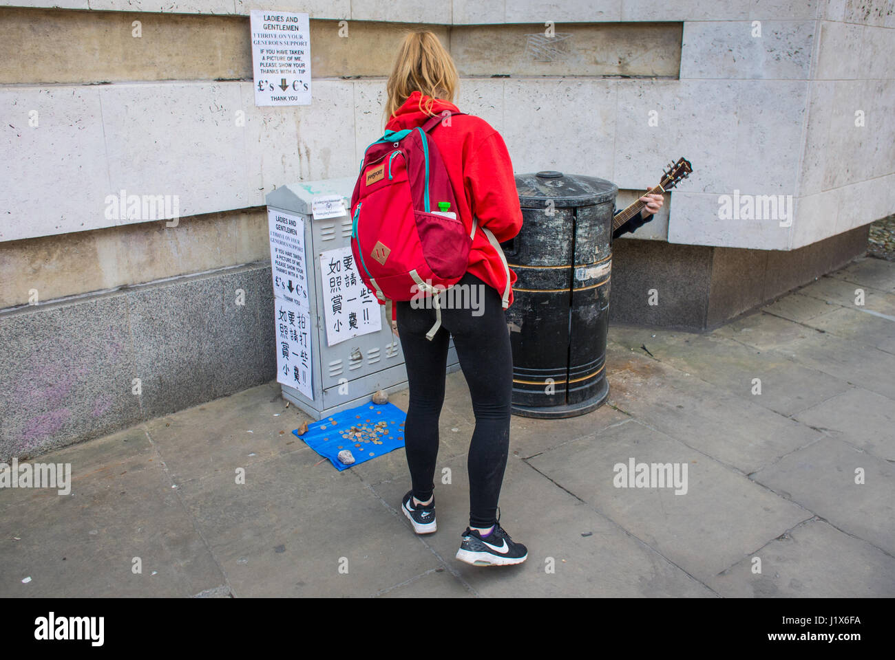 Busker busking in cambridge England UK Stock Photo - Alamy