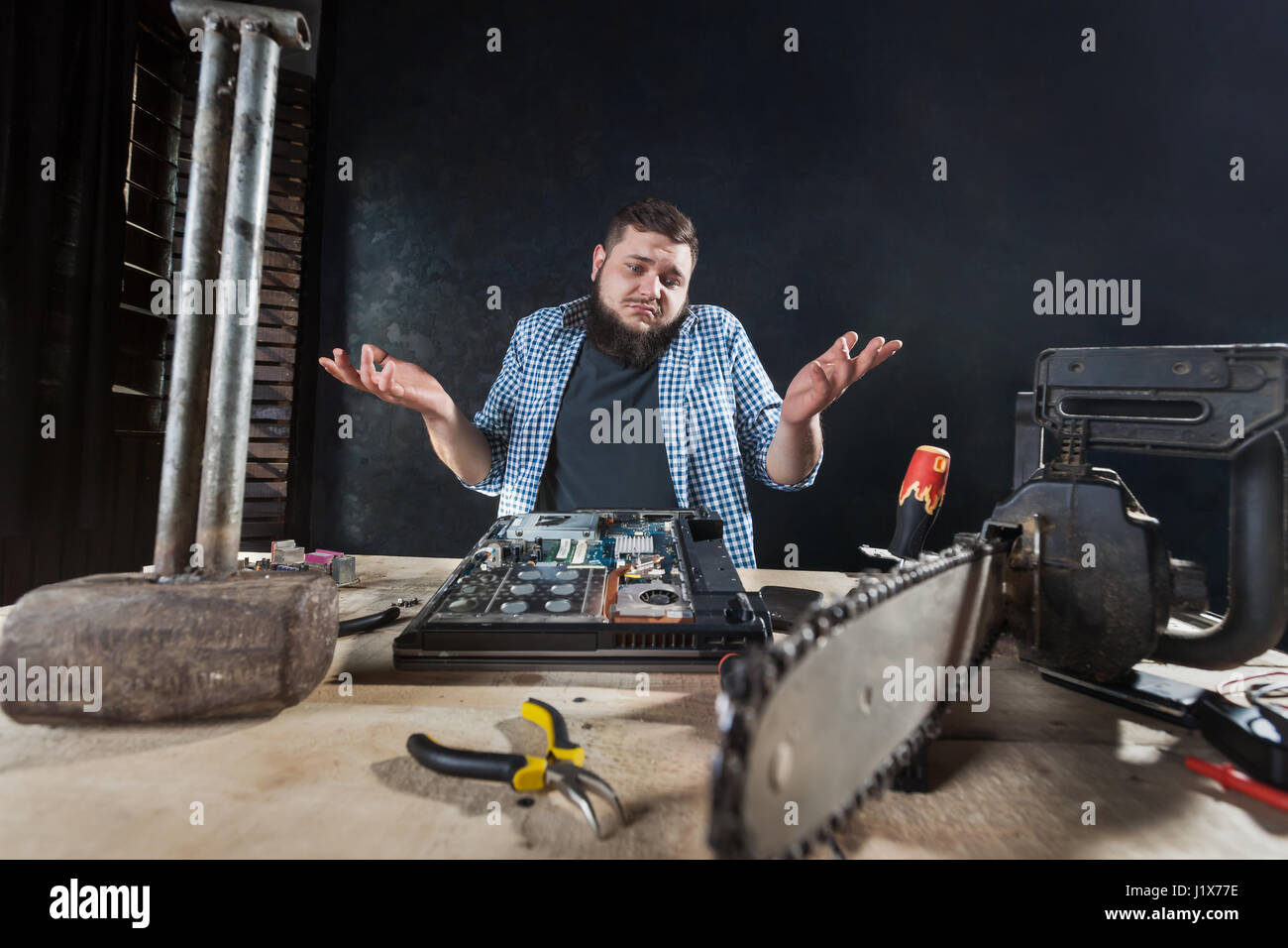 Repairman fixing problem with electronic components of computer ...