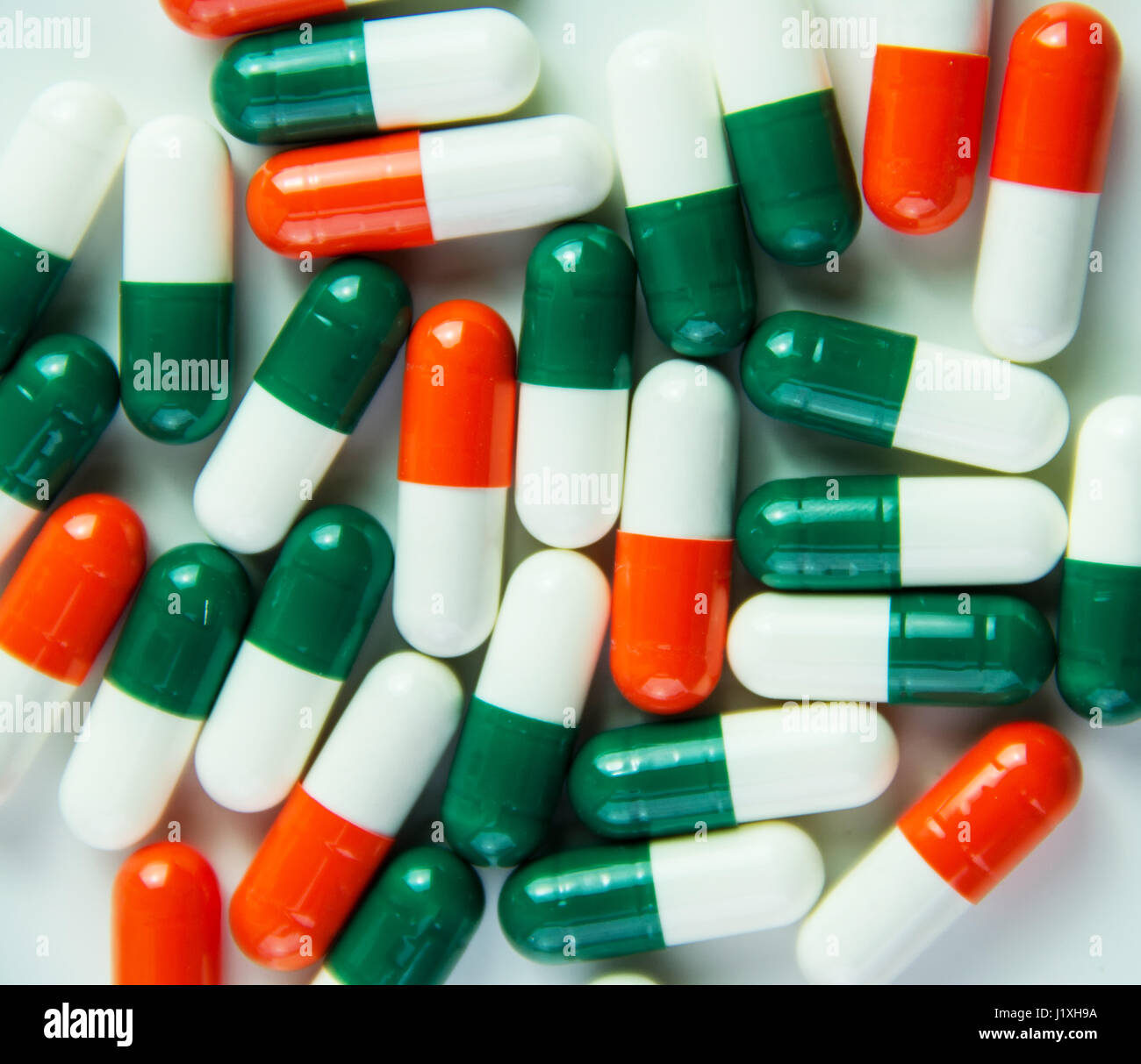 Group of generic pills with white background Stock Photo - Alamy