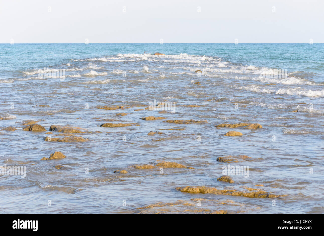 Little breakwater. Two sea currents in the opposite direction ...