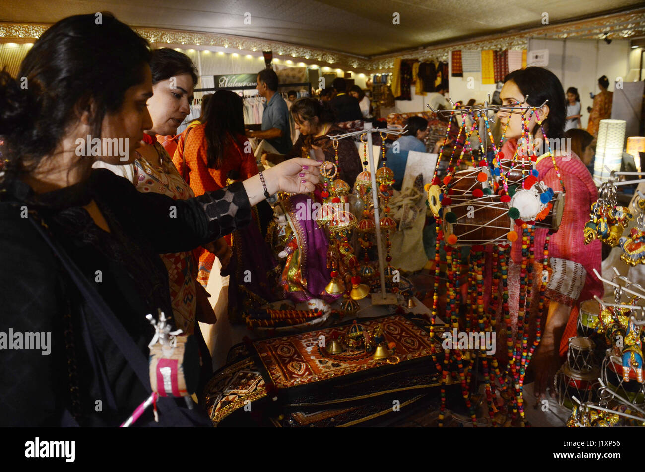 Lahore, Pakistan. 23rd Apr, 2017. Pakistani people takes interest in ...