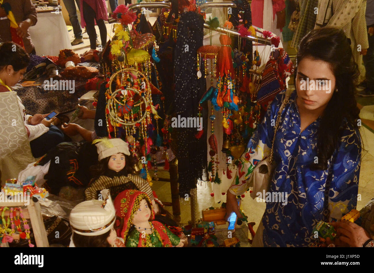 Lahore, Pakistan. 23rd Apr, 2017. Pakistani people takes interest in ...