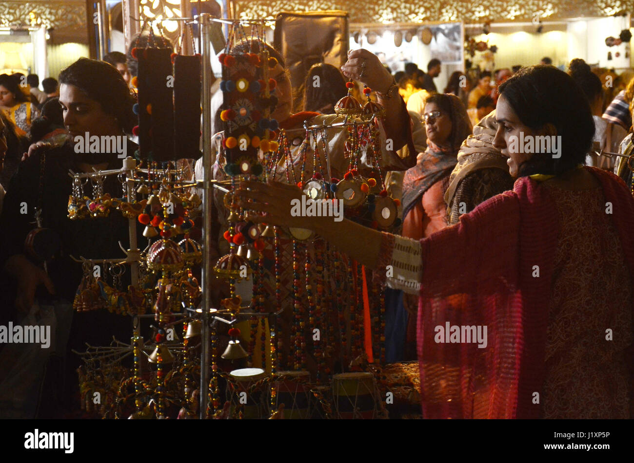 Lahore, Pakistan. 23rd Apr, 2017. Pakistani people takes interest in ...