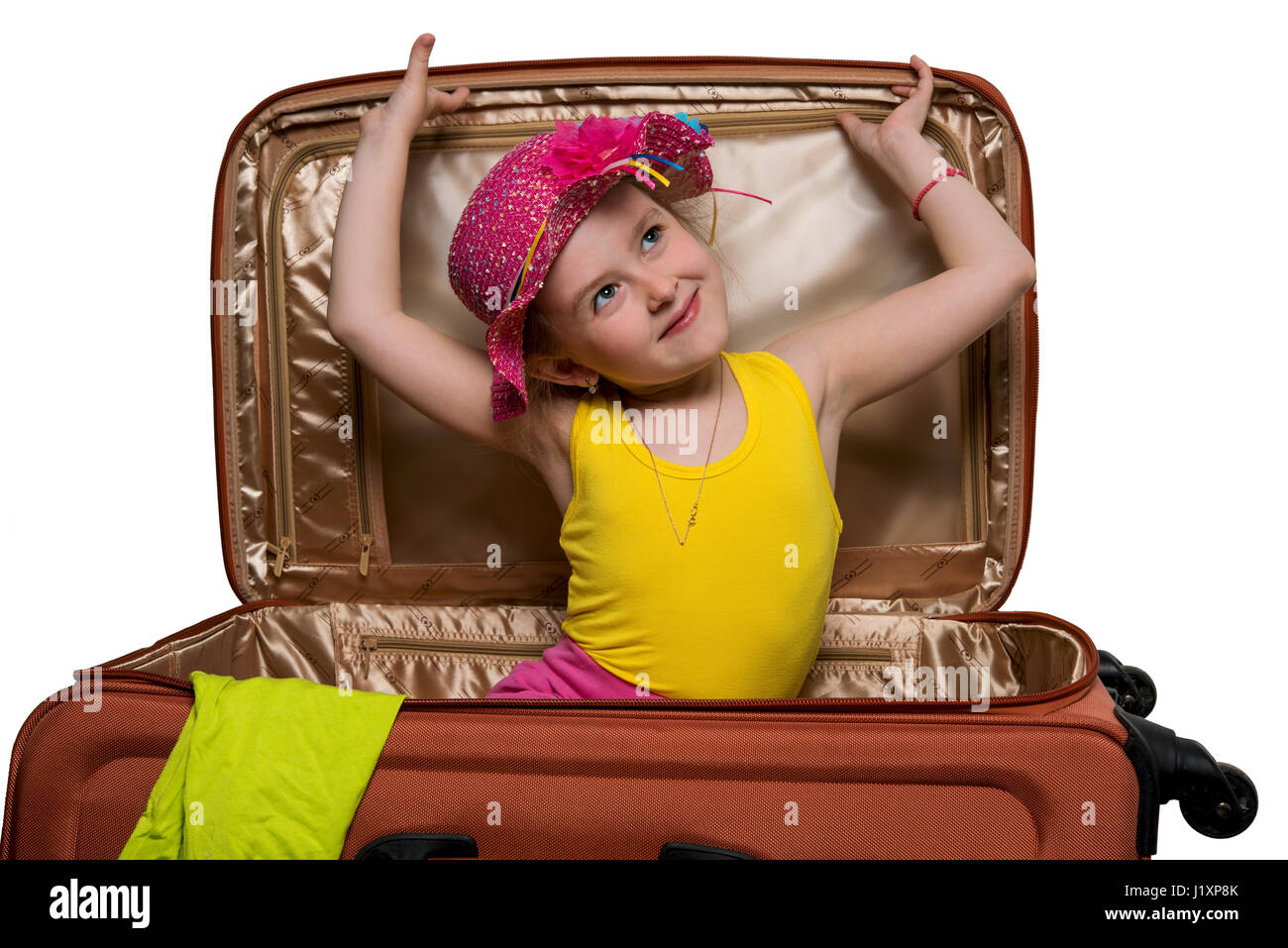 Girl packing suitcase hi-res stock photography and images - Alamy