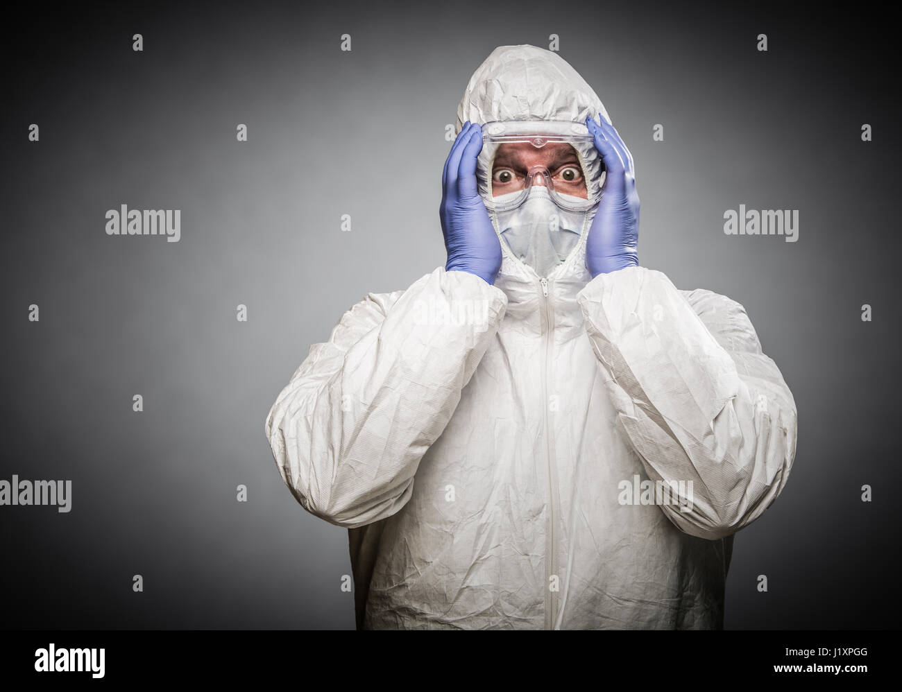 Doctor wearing protective hazard suit hi-res stock photography and ...