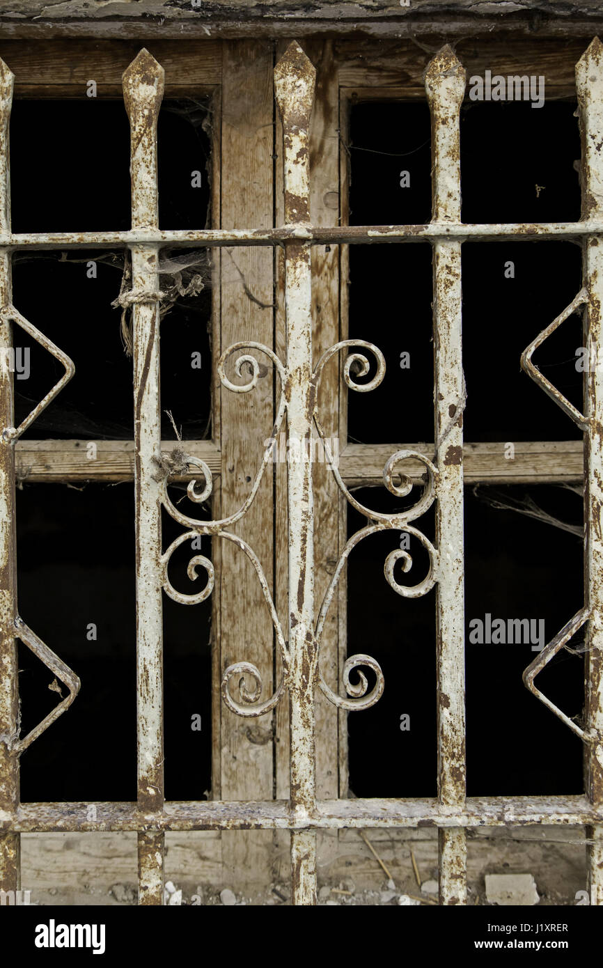 Metal fence, old window, detail of a protection fence Stock Photo - Alamy