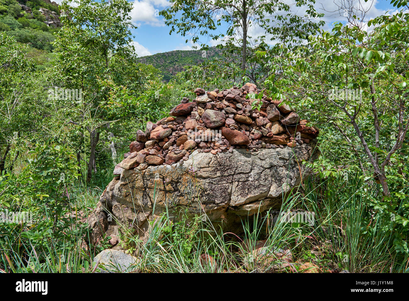 Ritual stone pile in landscape of Tsodilo Hills, Botswana, Africa ...