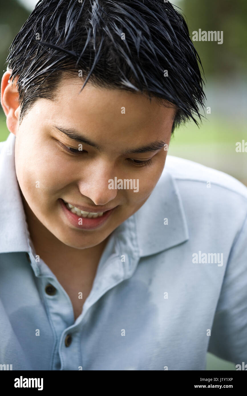 A portrait of a happy young asian man Stock Photo - Alamy