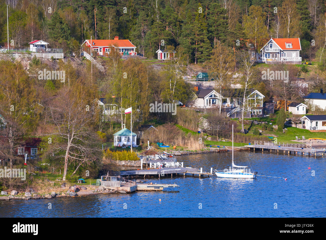Swedish rural landscape, coastal village with wooden houses Stock Photo ...