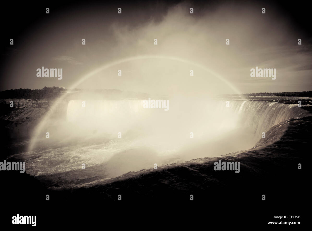 Rainbow over Niagara Falls Stock Photo - Alamy