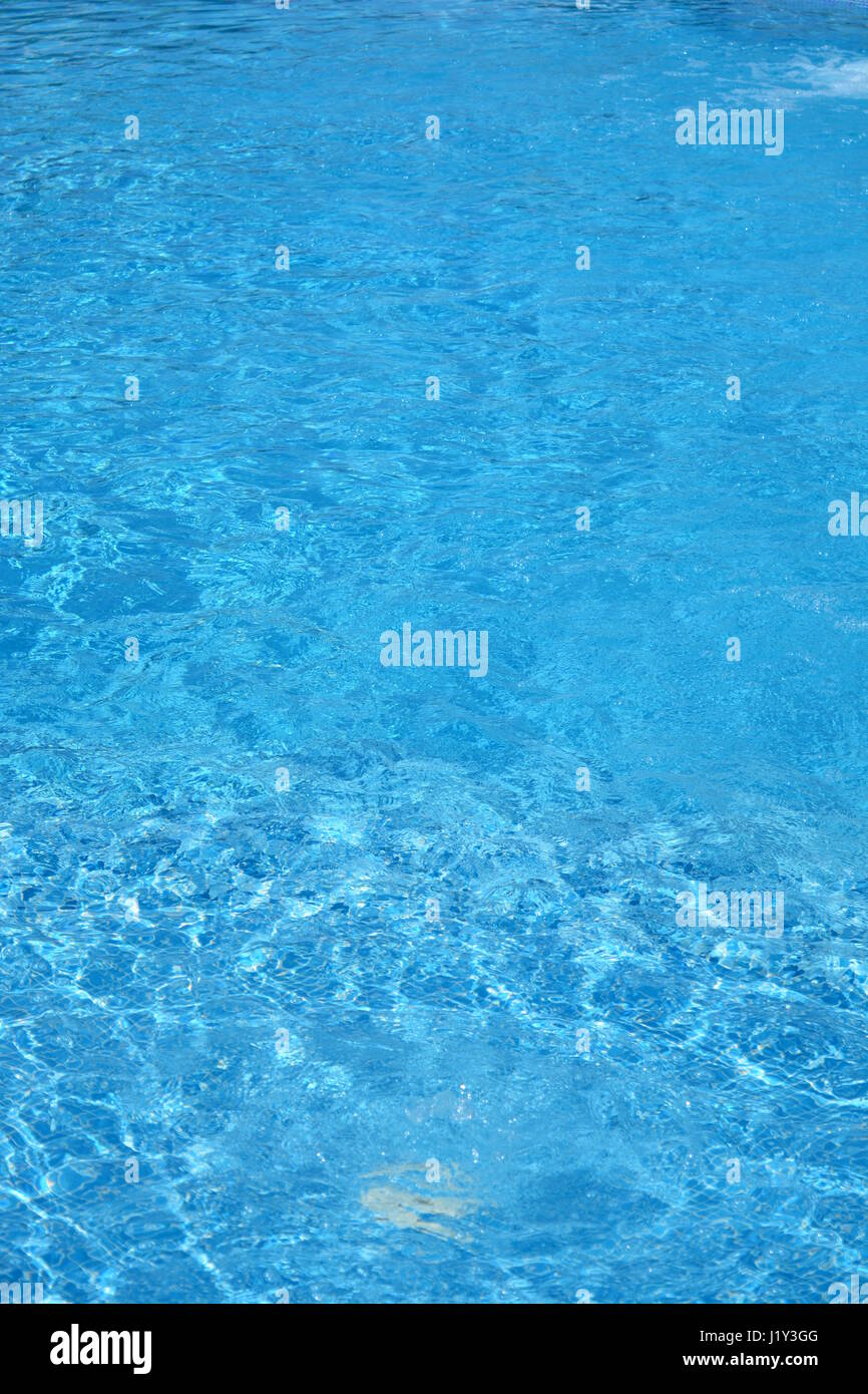 Blue swimming pool rippled water detail Stock Photo - Alamy