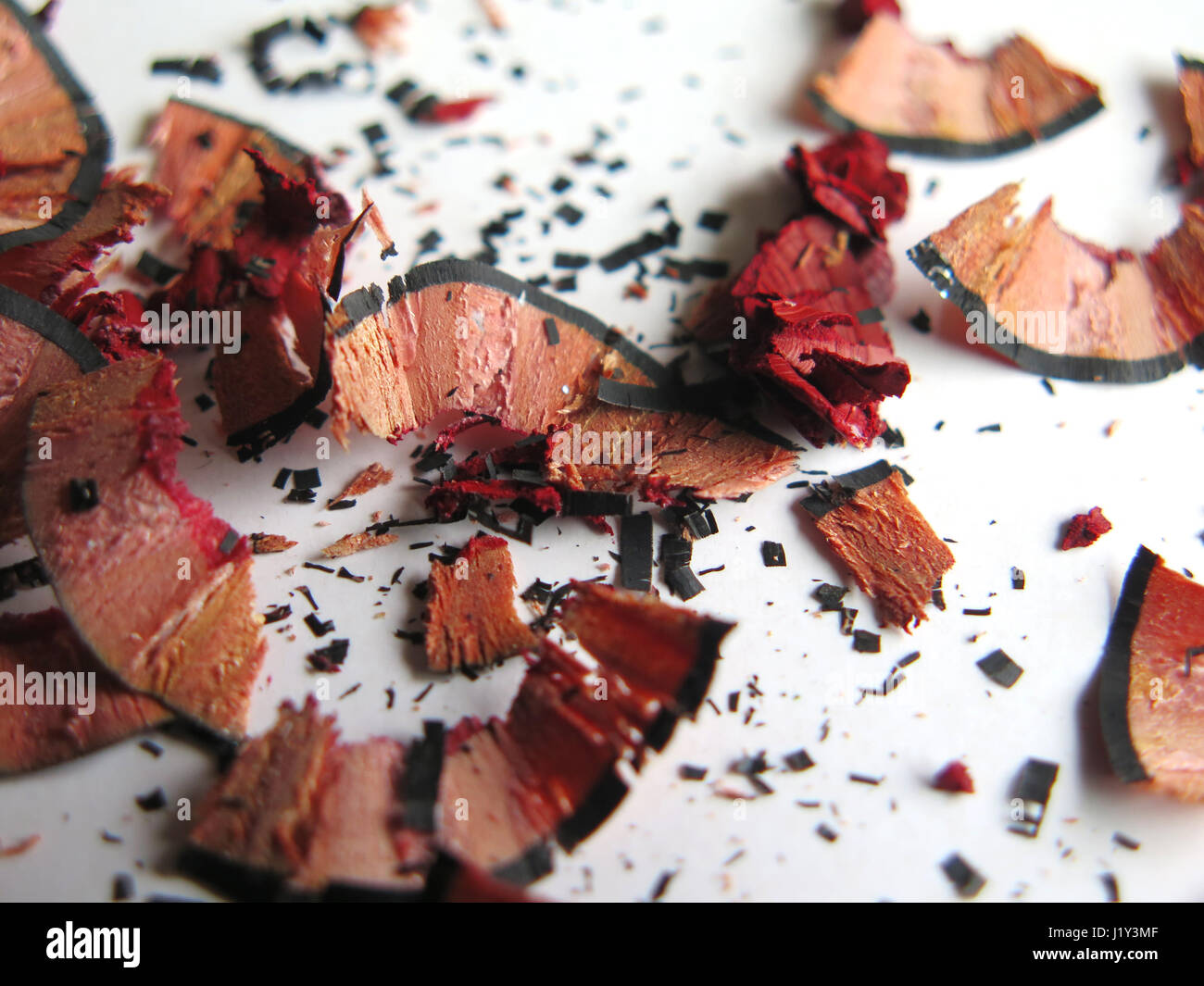 sharpen colourful colored pencil, wooden dust Stock Photo - Alamy