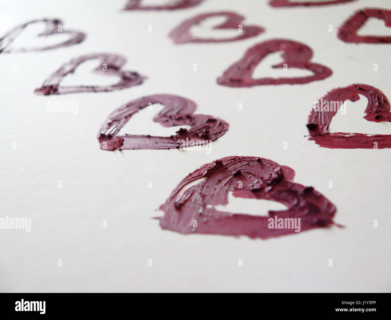 smashed red heart shape isolated on white background Stock Photo - Alamy