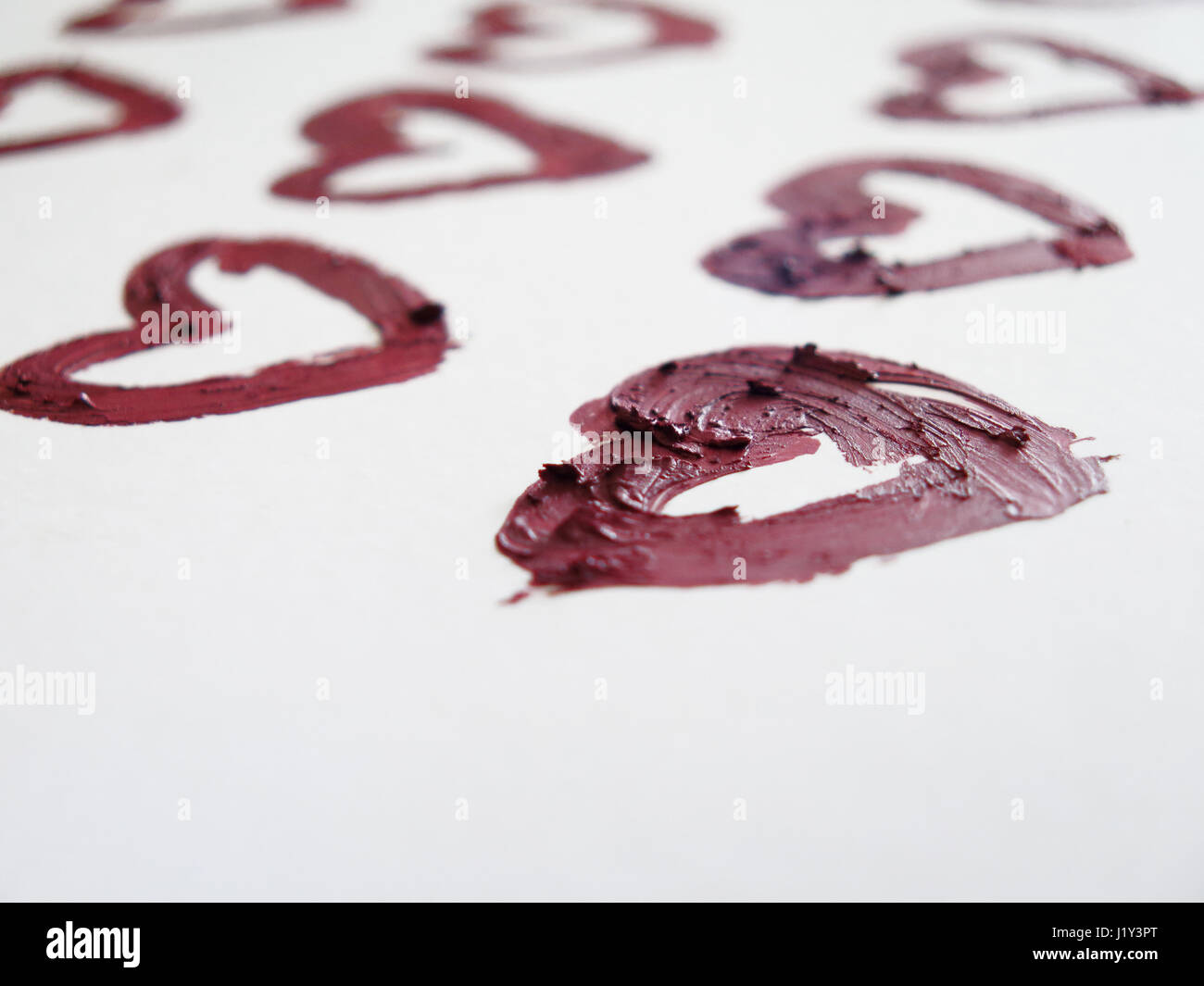 smashed red heart shape isolated on white background Stock Photo - Alamy